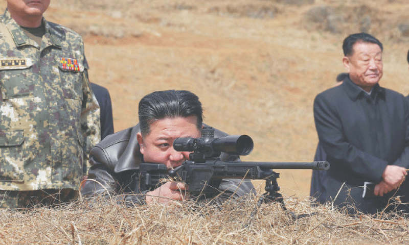 North Korean leader fires new sniper rifle while visiting troops ...