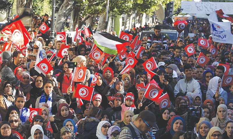 Thousands on streets for revolution anniversary in Tunisia - World ...