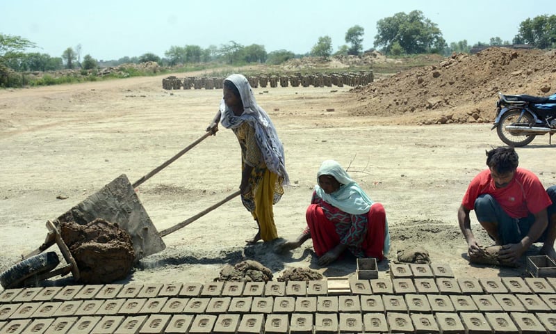 President, PM vow to protect workers’ rights - Pakistan - DAWN.COM