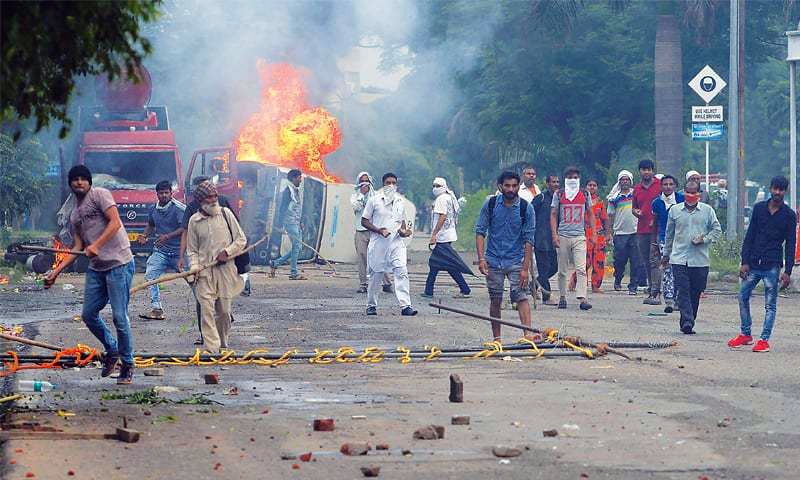Clashes claim 32 lives in India as court convicts guru of rape ...