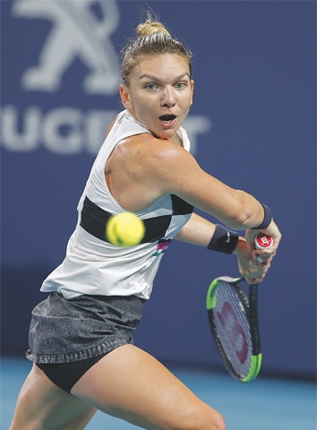 Federer shines on soggy day in Miami - Sport - DAWN.COM