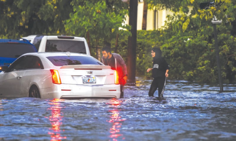 Three days of rain thwart Florida reopening - World - DAWN.COM