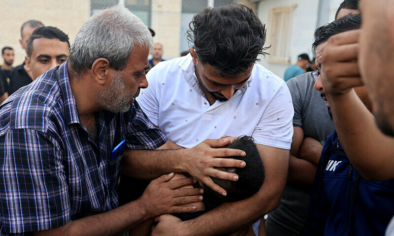 PHOTOS: Mourning in Gaza as Israeli bombardments continues - DAWN.COM