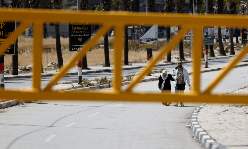 READ: West Bank town becomes ‘big prison’ as Israel fences it in - DAWN.COM