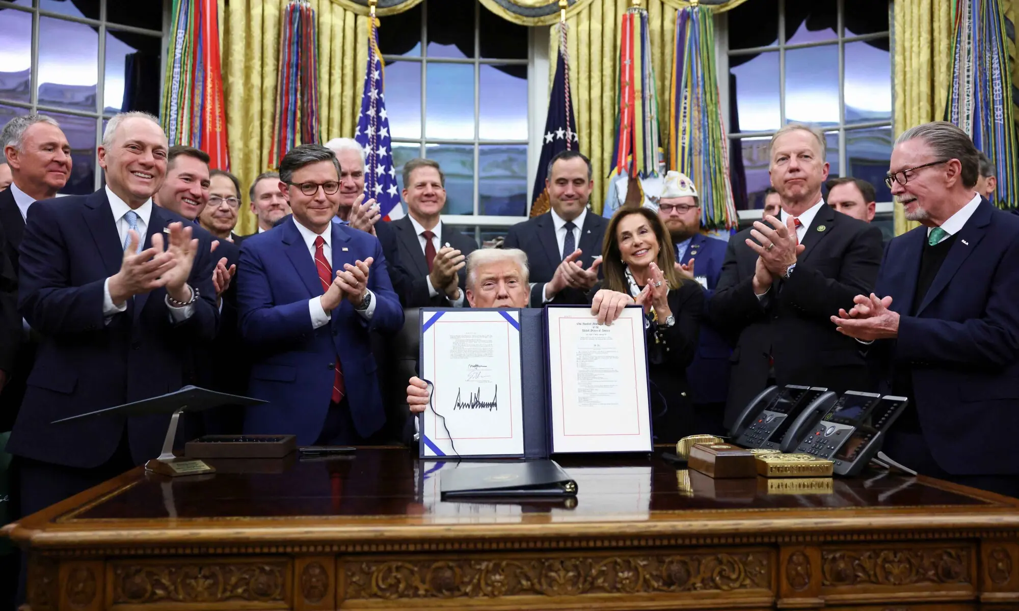 Trump signs deal to end longest US government shutdown in history ...