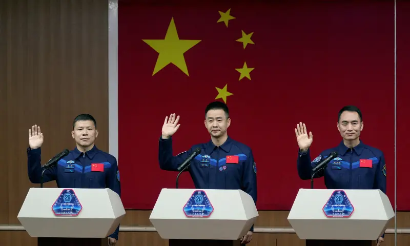 Chinese astronauts return to Earth after vessel damaged by space debris ...